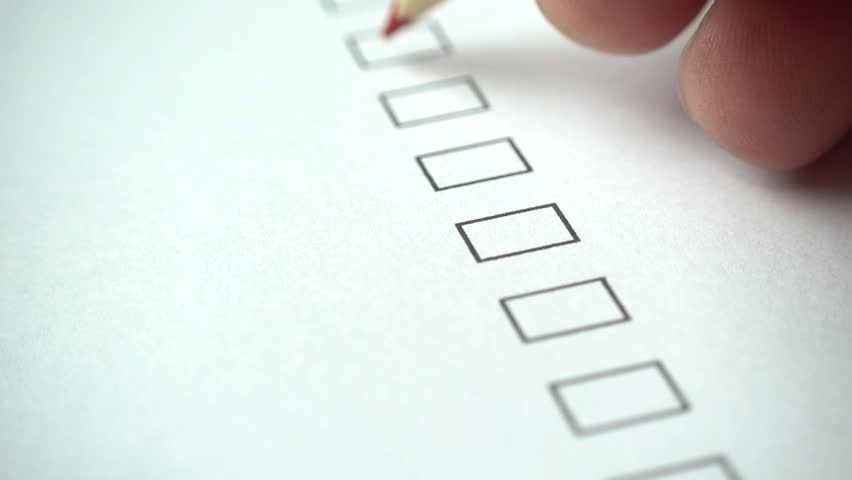 A Person Checking Off A To Do List. Check All The Boxes Of A Checklist ...