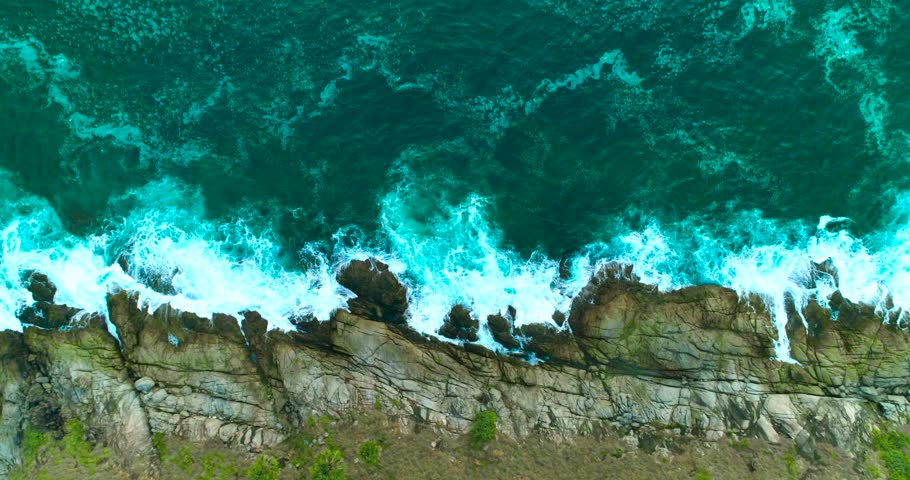 Waves washing over rocks on the shoreline image - Free stock photo ...