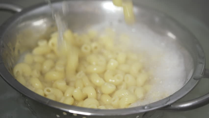 Boiling Pasta. Draining Macaroni Water Stock Footage Video (100% ...
