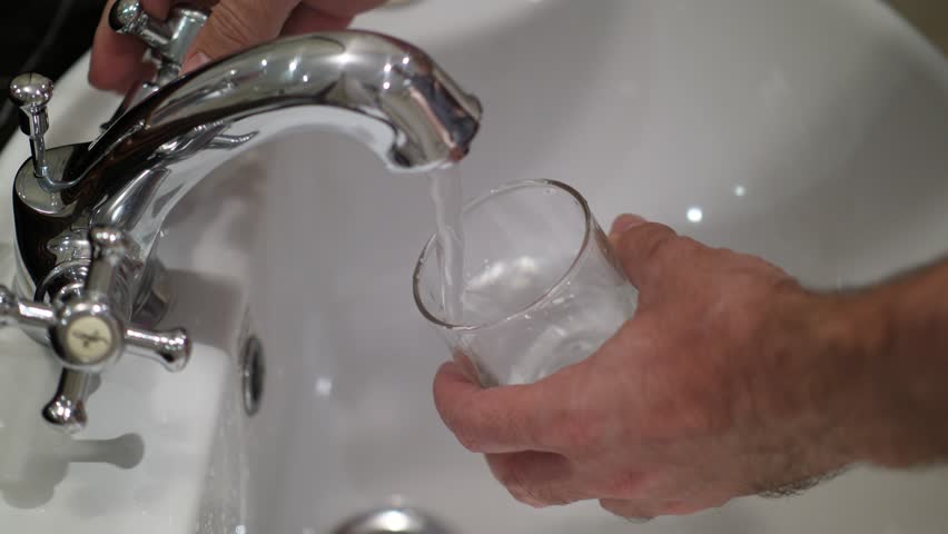 Man Quickly Fill up Glass Stock Footage Video (100% Royalty-free ...