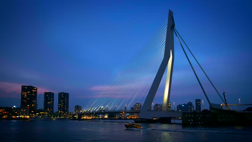 Skyline and Erasmus Bridge at night in Rotterdam, Netherlands image ...