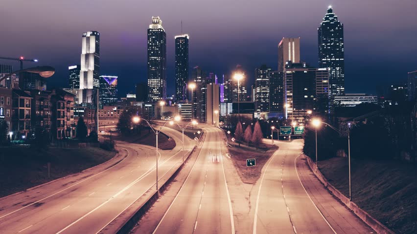 Cityscape with night lights with roads and skyscrapers in Atlanta ...