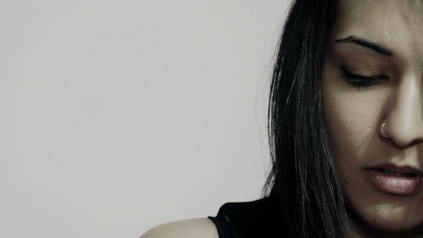 Stock Video Clip of sad woman portrait: half face portrait | Shutterstock