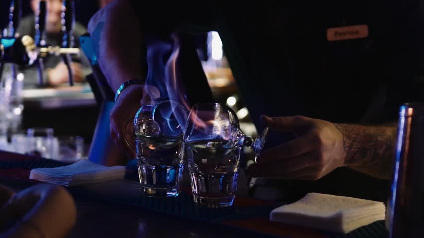 Barman Sets Fire to a Stock Footage Video (100% Royalty-free ...