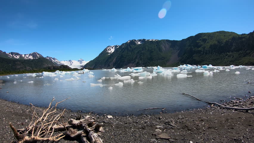 Landscape with snow-capped mountains with ice and water in Alaska image ...