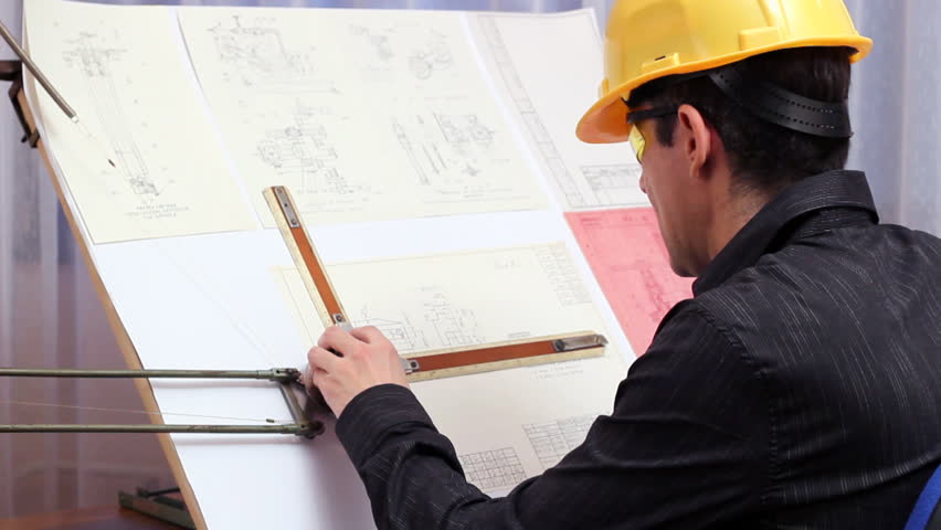 Stock video of engineer working on blueprint. man draws | 1060507 ...