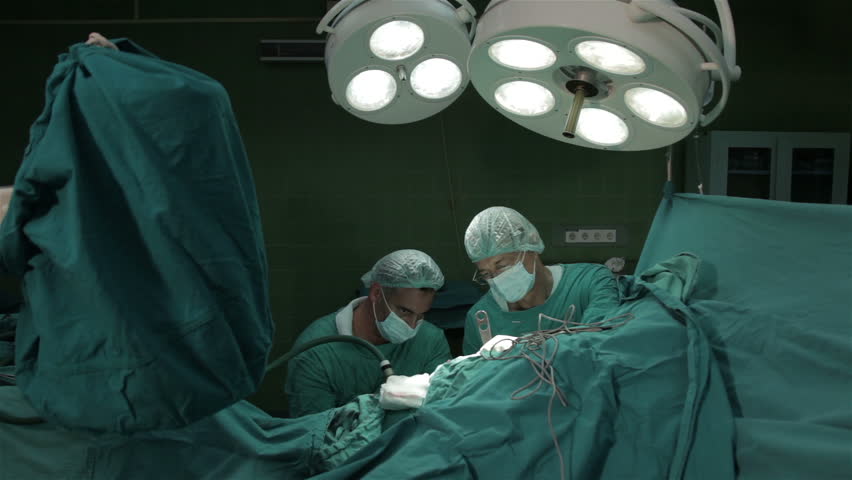 Hip Replacement. Surgeons Team Performing Hip Operation In Hospital ...