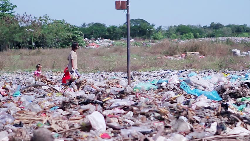 Myanmar, Yangon. 21.11.2013 Children Walk On The City Dump. Children In ...