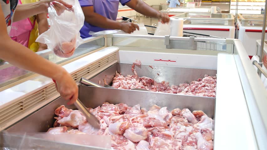 Woman Shopping for Chicken Meat Stock Footage Video (100% Royalty-free ...