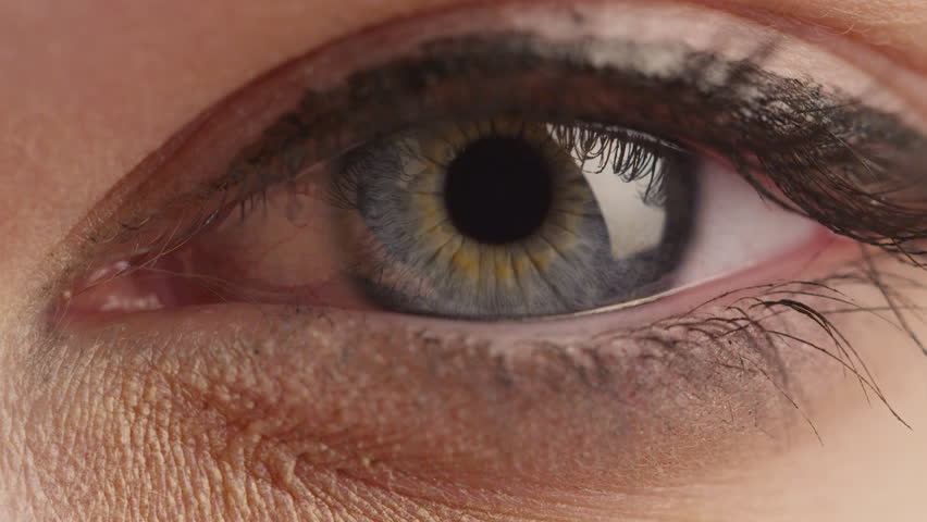 Close-up Shot Of A Woman Opening Her Blue Eyes With Light Day Make-up ...