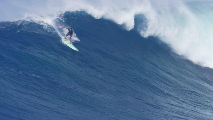 MAUI, HAWAII. January, 15 2016: Surfers Ride Giant Ocean Waves Breaking ...