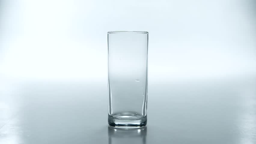 Water Pouring Into Invisible Glass Cup Then The Cup Starting To ...