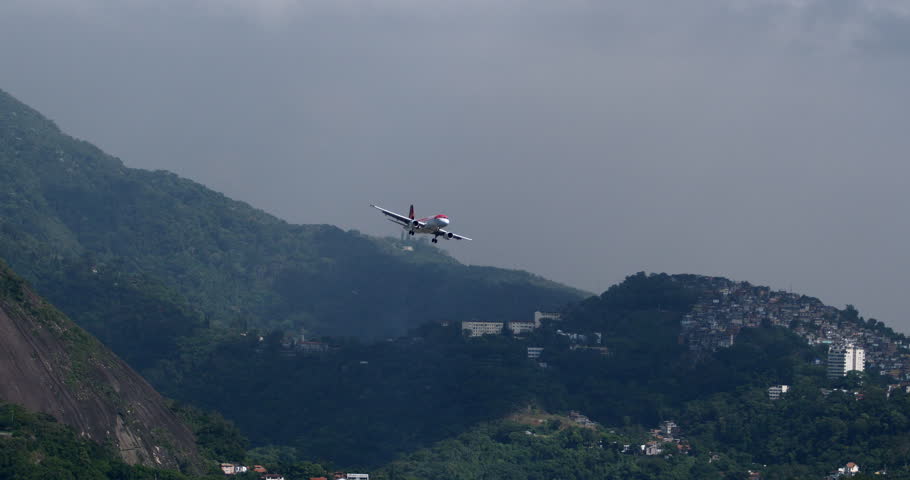 Airplane Flying In Front Of Sugarloaf Mountain In Rio De Janeiro ...