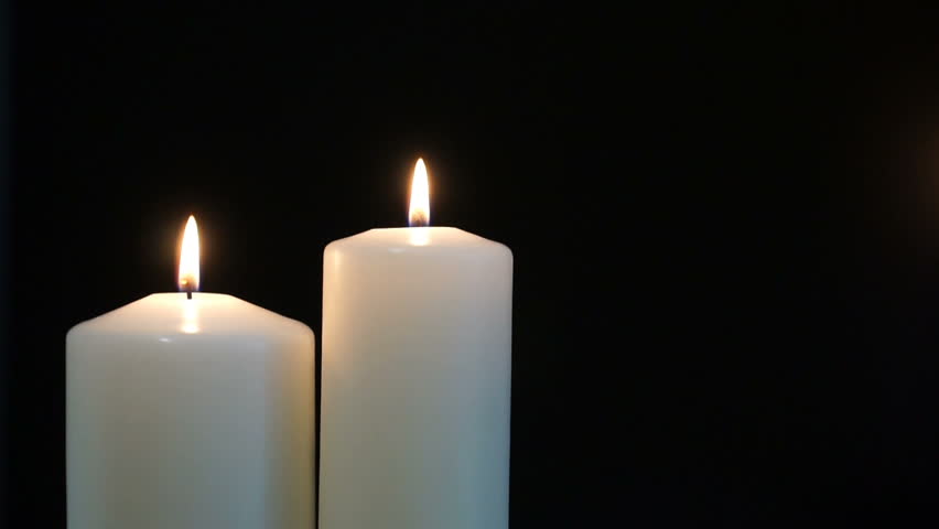 This Is A Seamless Loop Of 3 Warm Candles Gently Burning In A Black ...