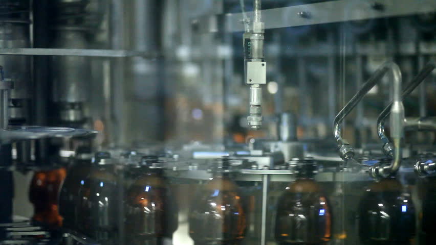 Spill Of Alcohol In Glass Bottles At The Plant. Conveyor Belt With ...