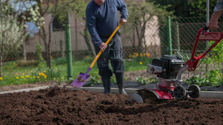 Man Shoveling Manure Into Wheelbarrow Stock Footage Video 2692469 ...