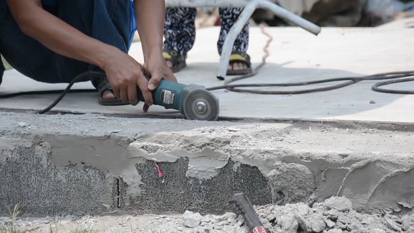 Video stock a tema cutting control groove in concrete slab | 16680367 ...