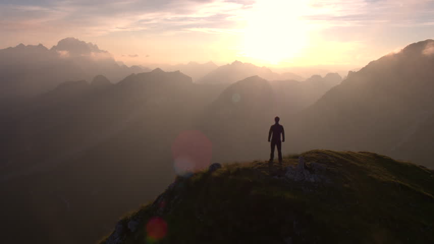 Man standing looking out from a mountain image - Free stock photo ...
