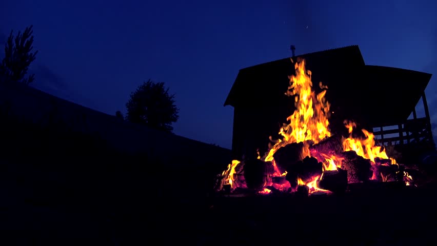 Stock video of bright huge cozy bonfire on cottage | 18410617 ...