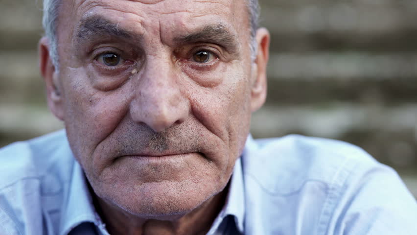 Video de stock de old man raises his worried face | 20540047 | Shutterstock