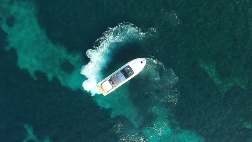 Perpendicular Aerial View Of Luxury Boat Rotating On Itself, While ...