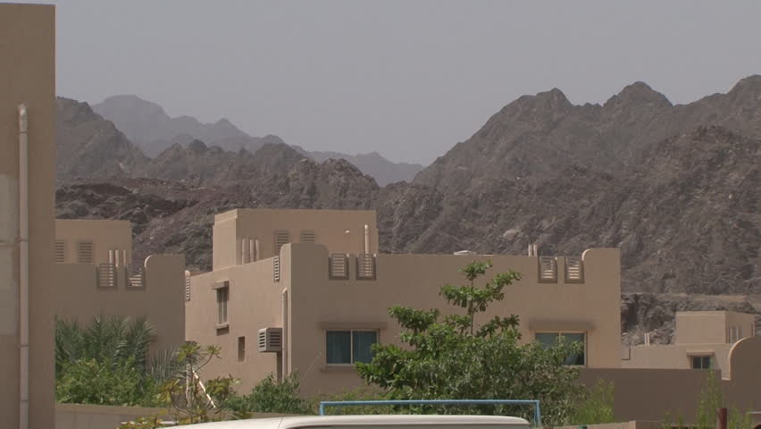 Hatta, Dubai. Tilt Down From Sky To The Hatta Fort Hotel With The Hajar ...