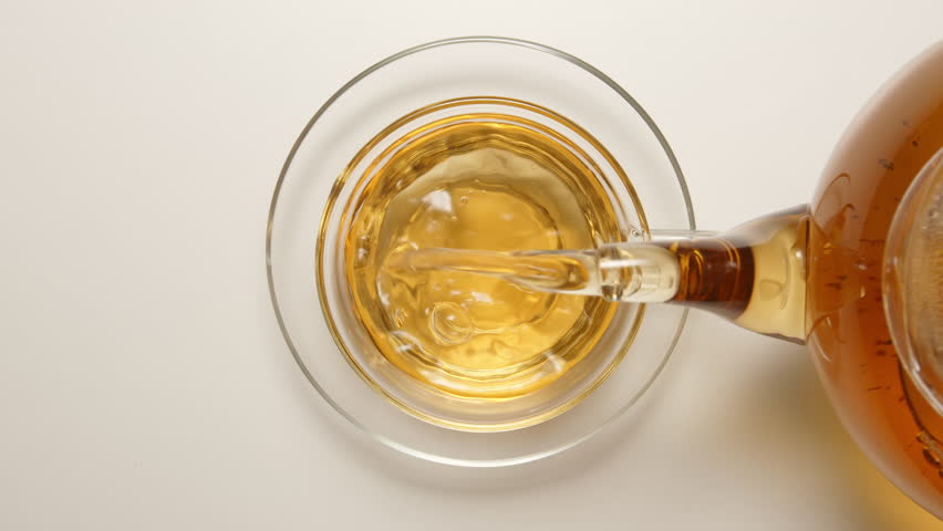 Stock video of slow motion: fresh tea flowing to | 22250587 | Shutterstock