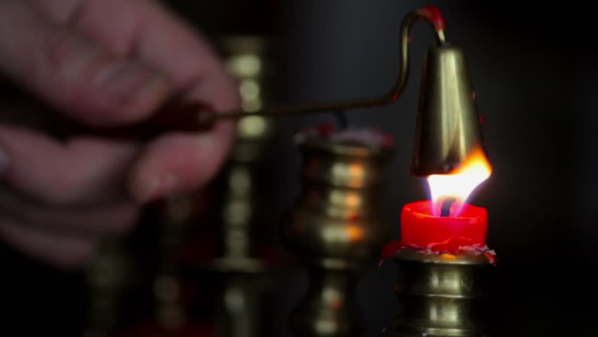 Extinguish Candle Fire With Brass Tool Stock Footage Video 2179642 ...