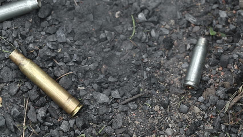Spent Ammunition Cartridges Falling from Stock Footage Video (100% ...
