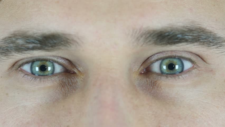 Close Up Of Sinister Looking Eyes Looking Deep Into Your Soul. Stock ...