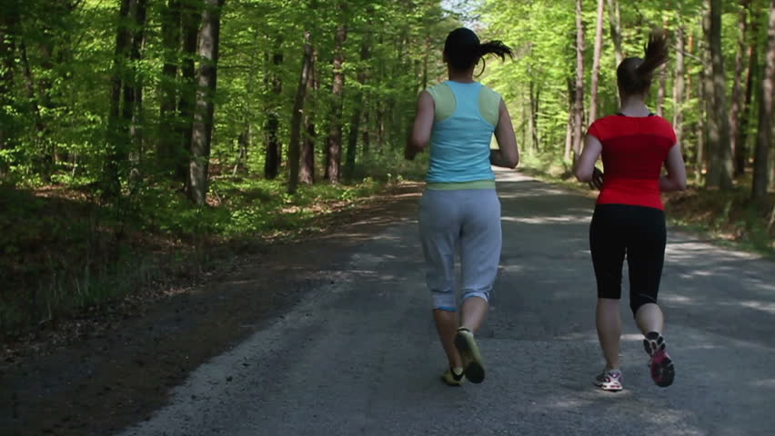 Two Young Woman Jogging in Stock Footage Video (100% Royalty-free ...