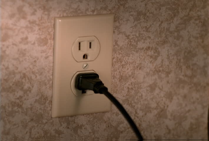 Unplugging Cord From Outlet To Save Electrical Energy Stock Footage ...