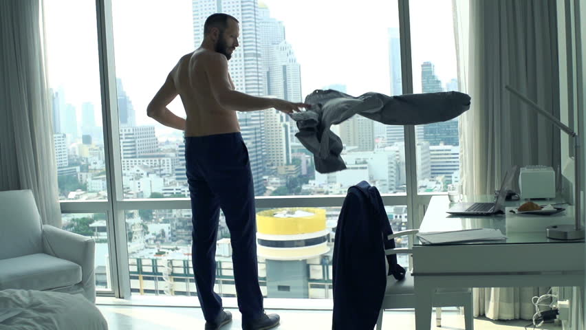 Young Businessman Taking Off Shirt Stock Footage Video (100% Royalty ...