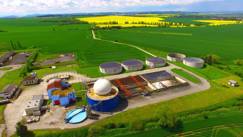 Camera Flight Over Biogas Plant From Pig Farm In Green Fields ...