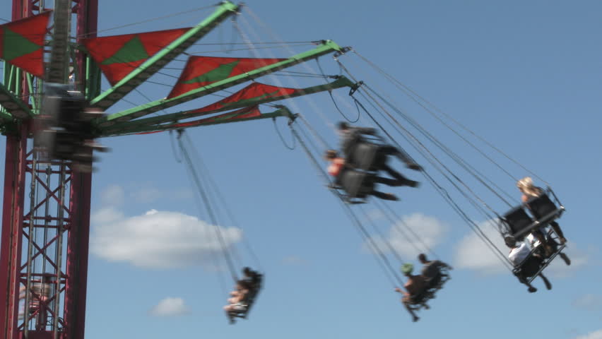 Slow Motion Swing Ride - 60fps. PARIS, FRANCE - 18 JULY 2015; The Fete ...