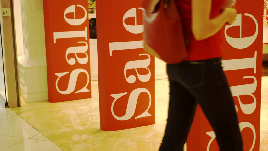 Stock video of girl entering shop. three big red | 28113097 | Shutterstock