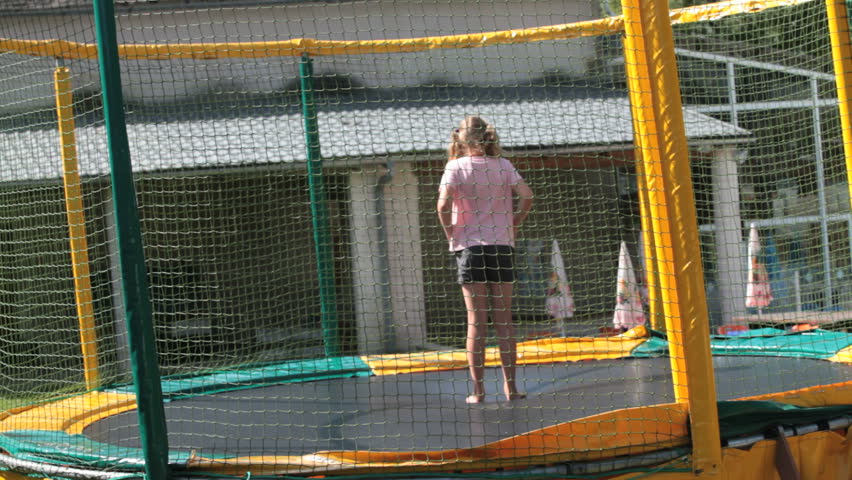 Girl Seen from Behind Jumping Stock Footage Video (100% Royalty-free ...