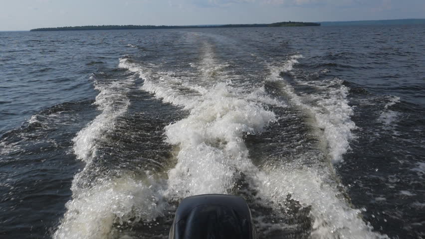 Power Boat Cutting Through The Waves - Slow Motion. Slow Motion Shot Of ...
