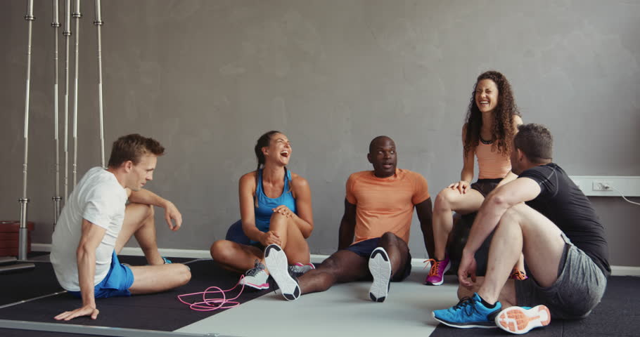Smiling Group Of Friends Laughing Together After A Workout Stock ...