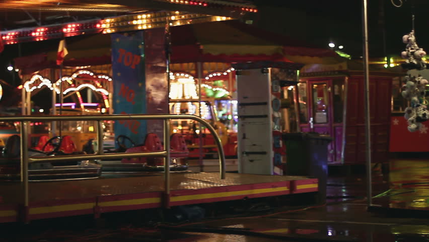 Stock Video Clip of Bumper cars in amusement park at night | Shutterstock