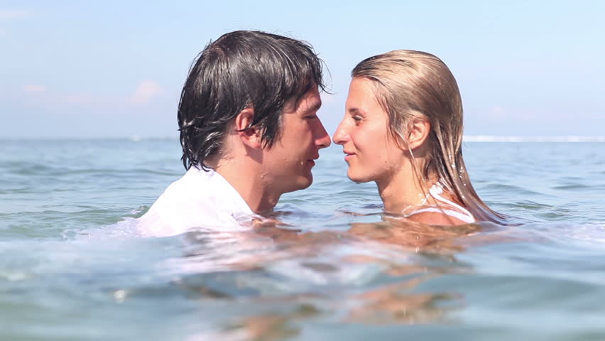 Stock video of pretty woman swimming in ocean then | 3062377 | Shutterstock