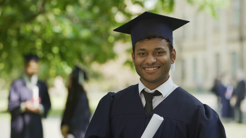 Smiling Hispanic Graduate Student Rejoicing Diploma, Success, Posing ...
