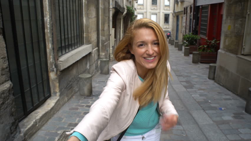 Stock video of follow me. young woman leading a | 30867847 | Shutterstock