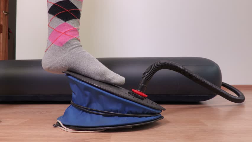Woman Using Air Pump at Stock Footage Video (100% Royalty-free ...