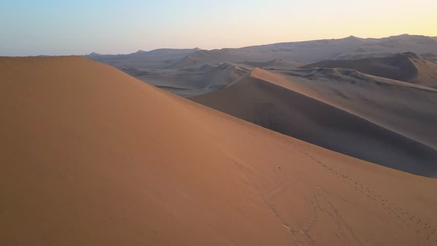 4K Aerial View Of Male Tourist Walking Over The Sand Dunes In The Namib ...