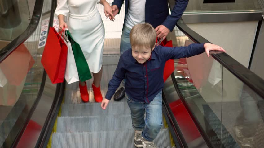 Stock video of family christmas shopping. parents with the | 31047007 ...