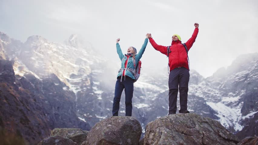 Hiker Reaching Mountain Top. SLOW MOTION. Young Happy Hiking Girl ...