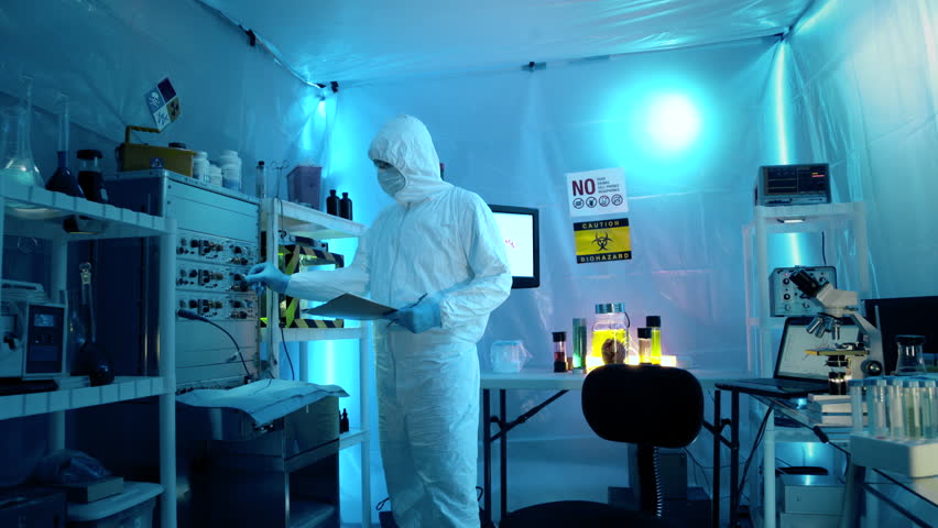 Stock video of tech or scientist wearing hazmat | 32679277 | Shutterstock