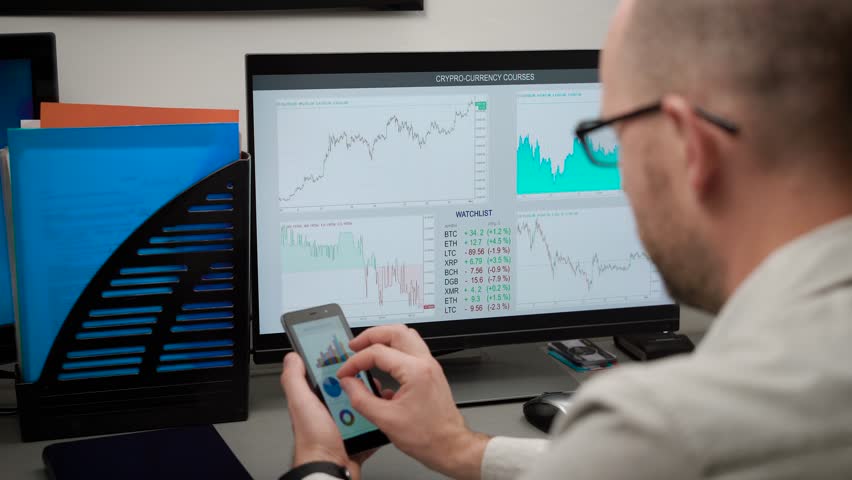 Stock video of the trader works with electronic reports | 32801557 ...