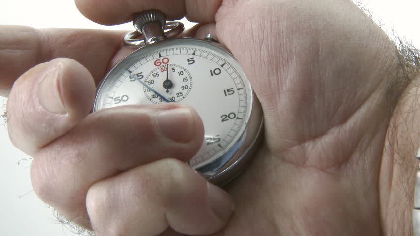 Passing Of Time. Hands Holding Fast Turning Clock. Saturated Grading ...